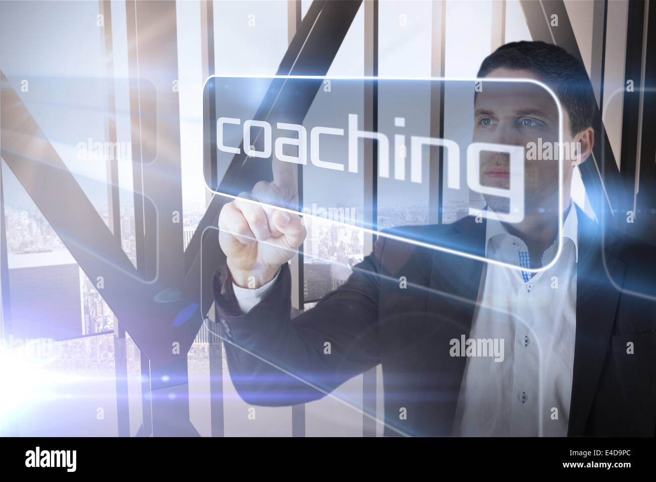 Businessman presenting the word coaching Stock Photo - Alamy