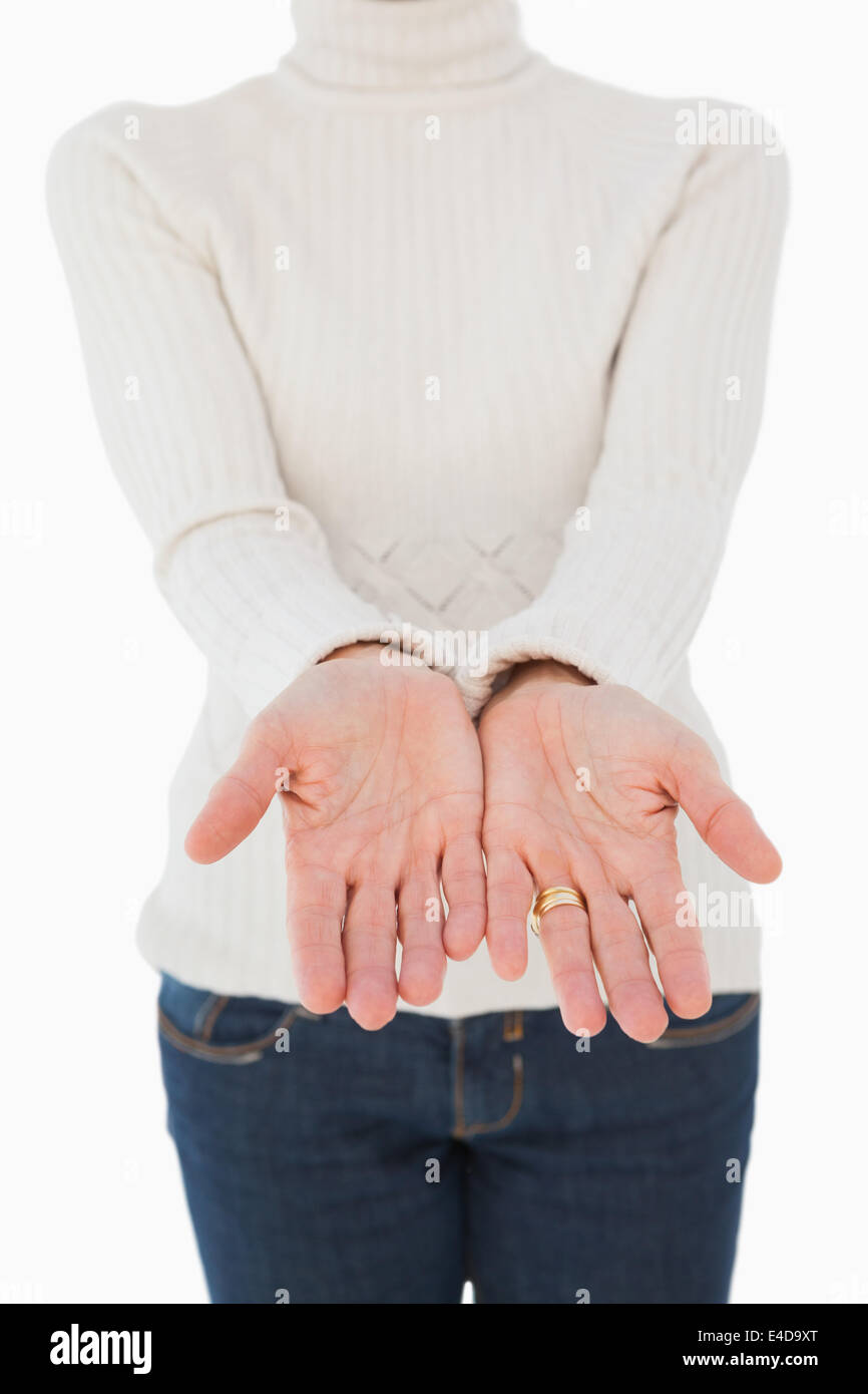 Woman standing with her hands out Stock Photo - Alamy