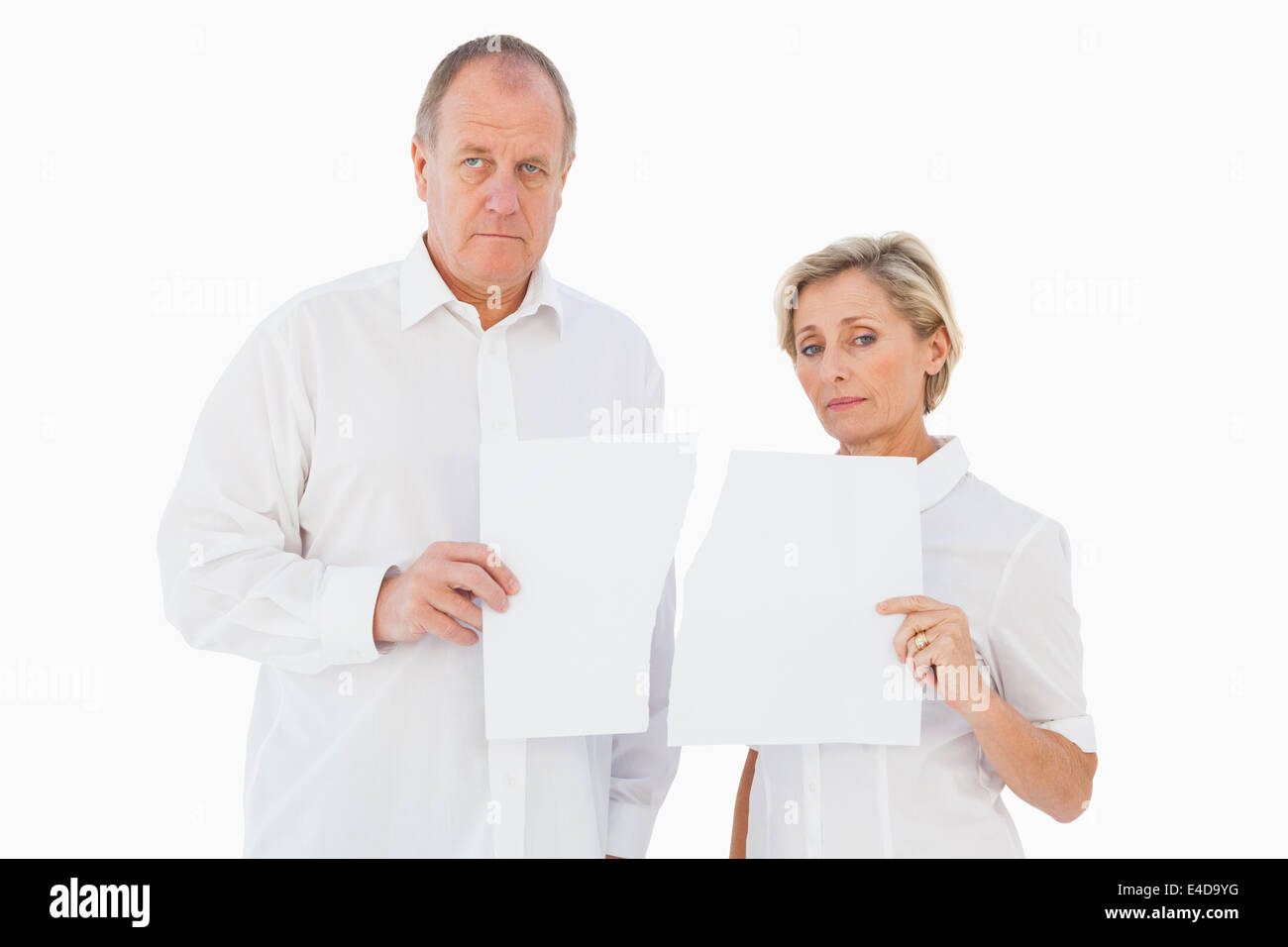 Woman holding piece of paper upset hi-res stock photography and images ...