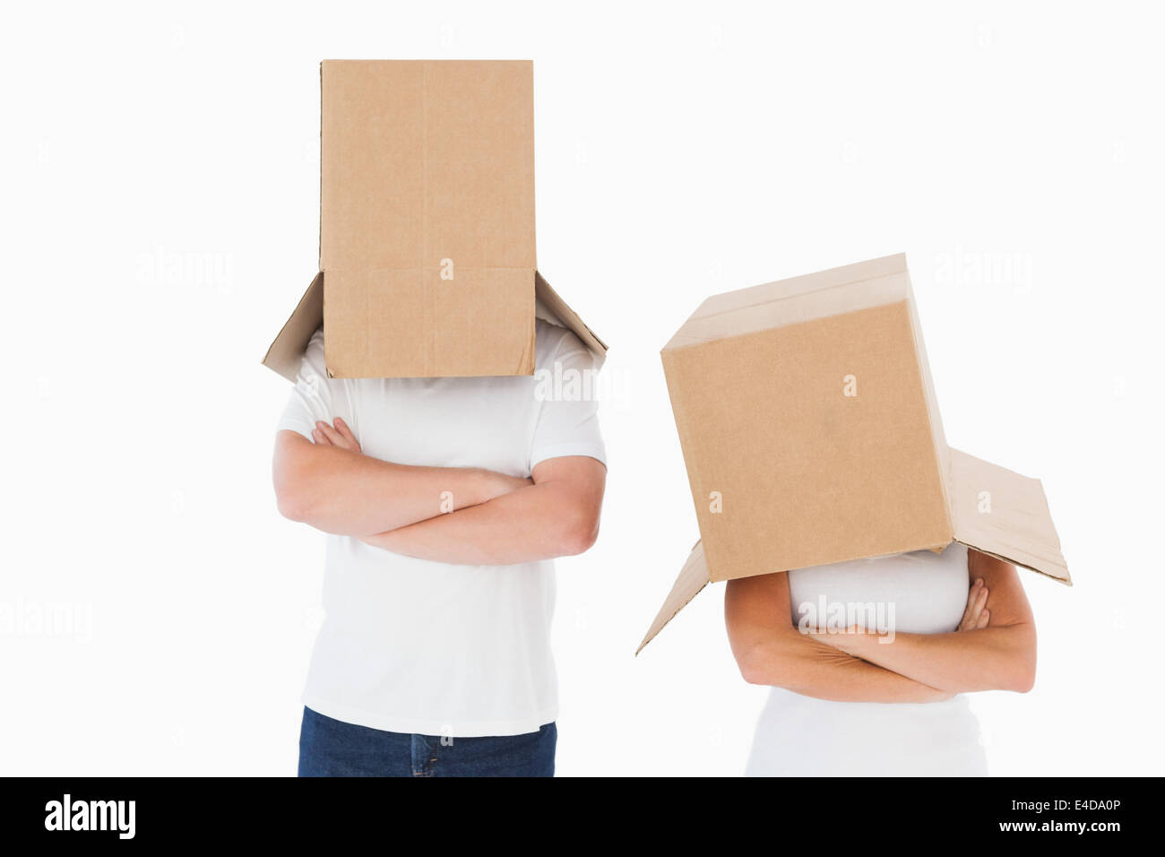 Mature couple wearing boxes over their heads Stock Photo - Alamy