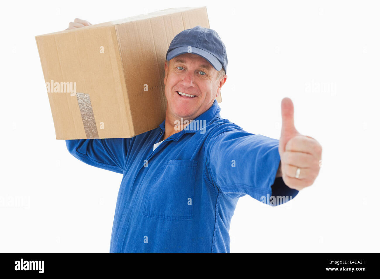 Happy delivery man holding cardboard box Stock Photo - Alamy
