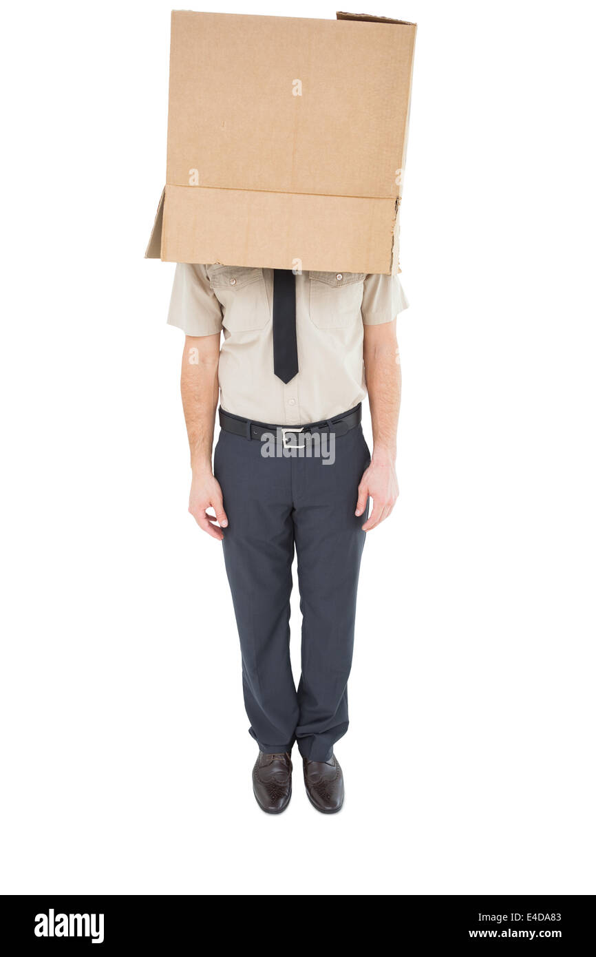 Businessman standing with box on head Stock Photo - Alamy