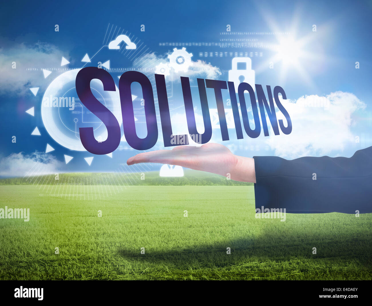 Businesswomans hand presenting the word solutions Stock Photo - Alamy