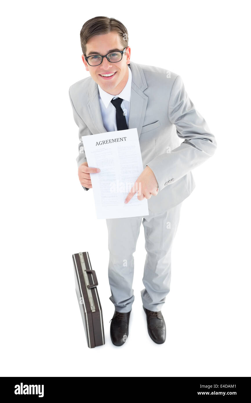 Geeky businessman showing contract to camera Stock Photo - Alamy