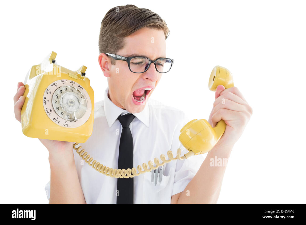 Geeky businessman shouting at retro phone Stock Photo - Alamy