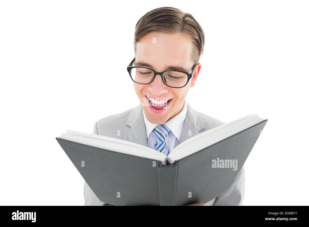 Geeky preacher reading from black bible Stock Photo - Alamy