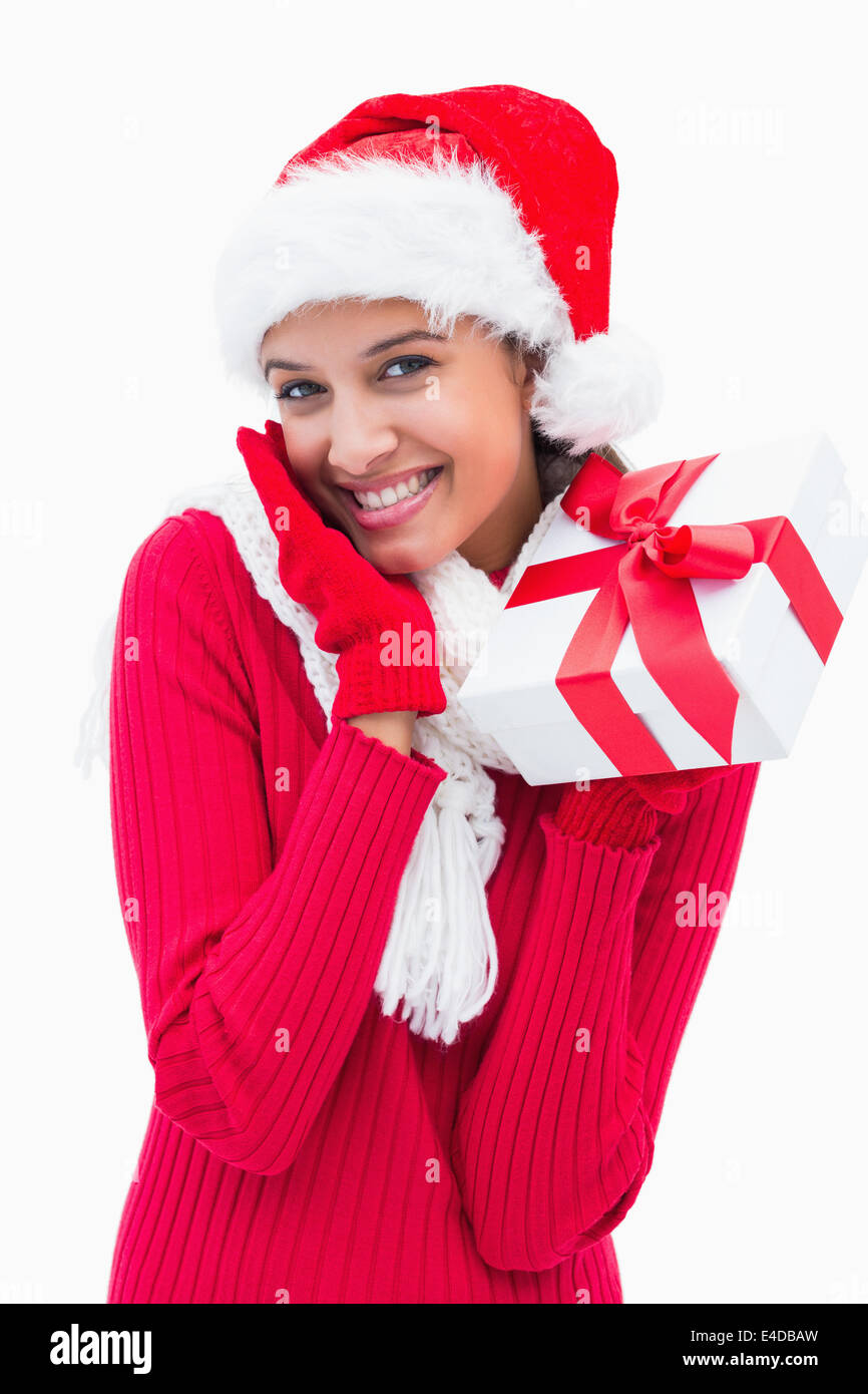 Woman holding festive gift hi-res stock photography and images - Alamy