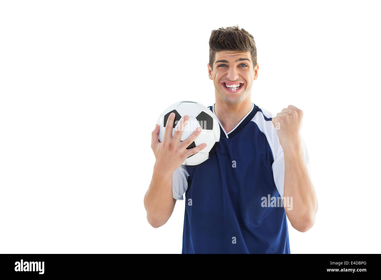 Football player in blue celebrating Stock Photo - Alamy