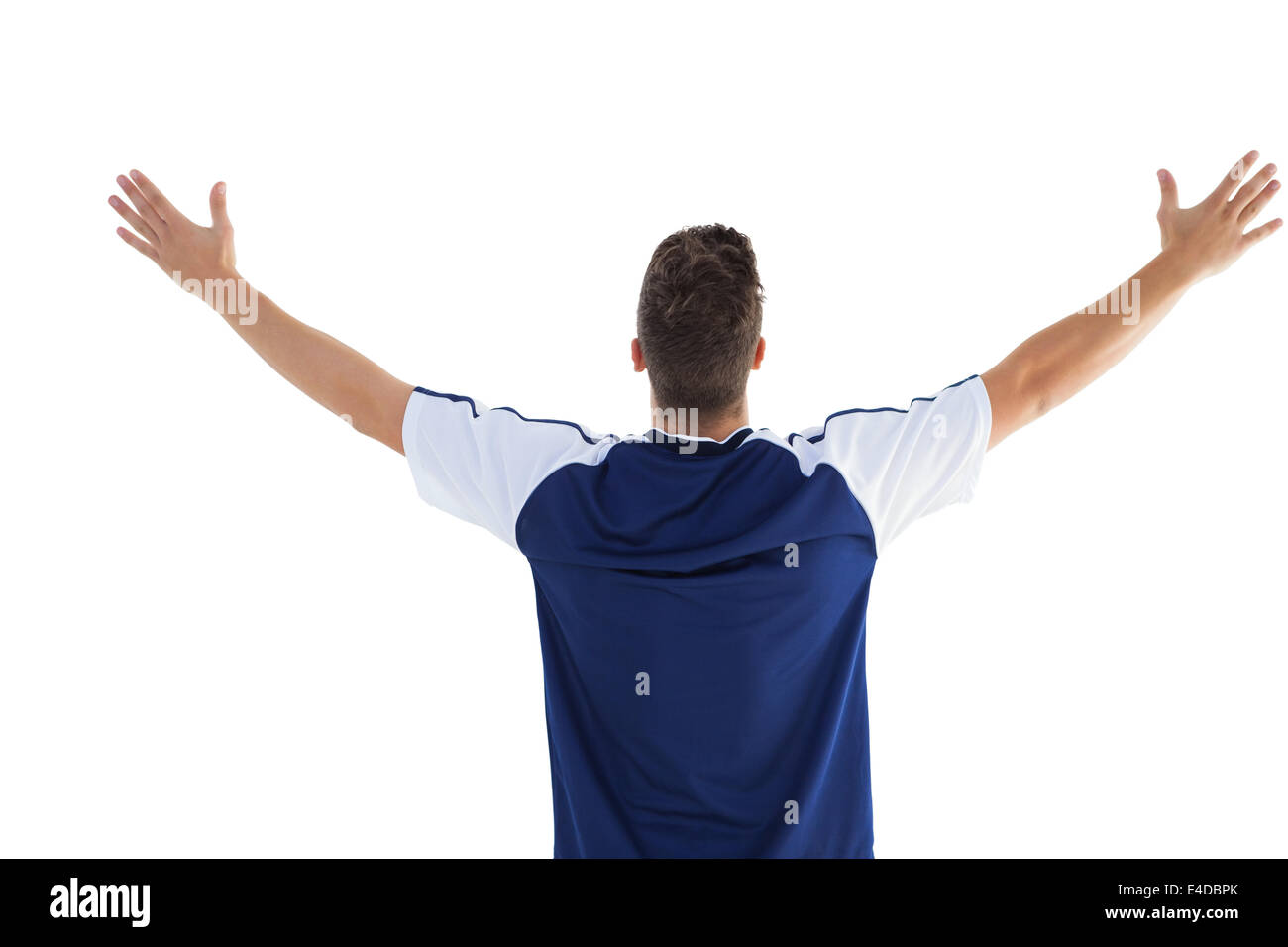 Football player in blue celebrating a victory Stock Photo - Alamy
