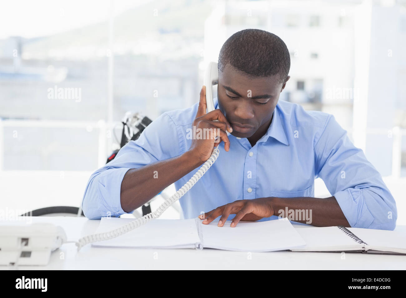 Serious phone hi-res stock photography and images - Alamy