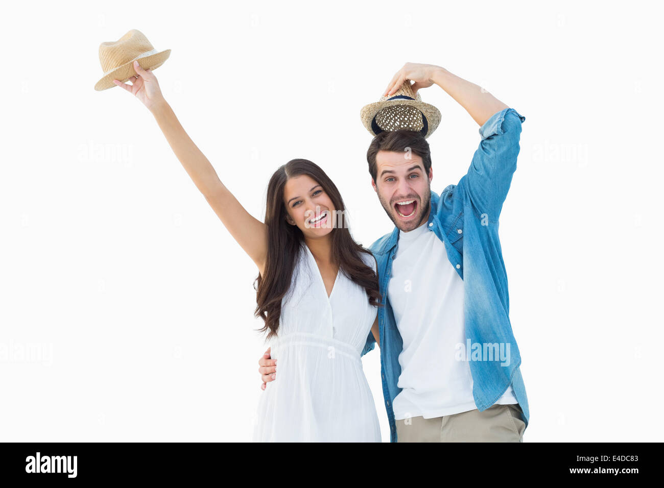 Happy hipster couple smiling at camera and cheering Stock Photo - Alamy