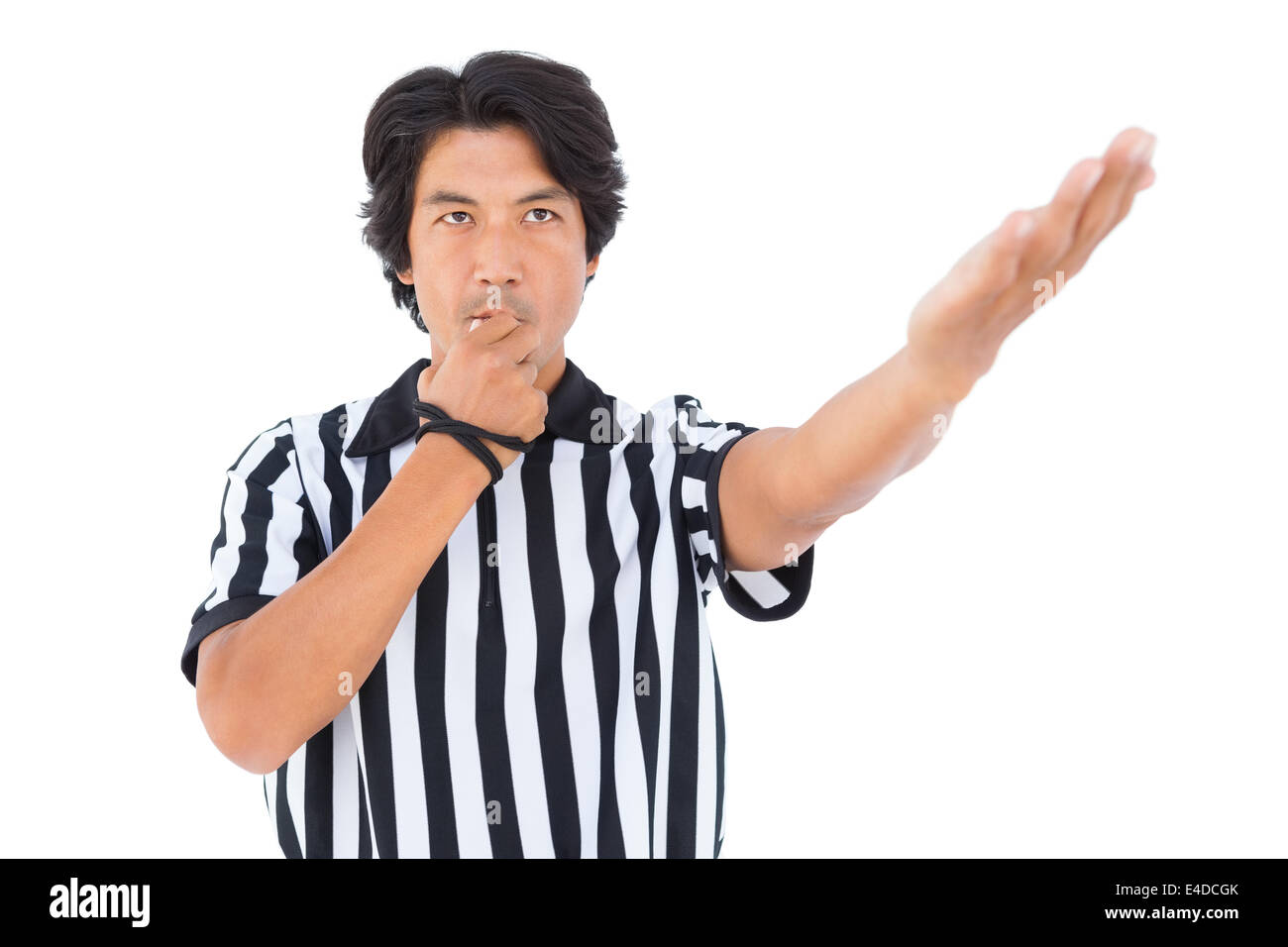 Stern referee blowing his whistle Stock Photo - Alamy