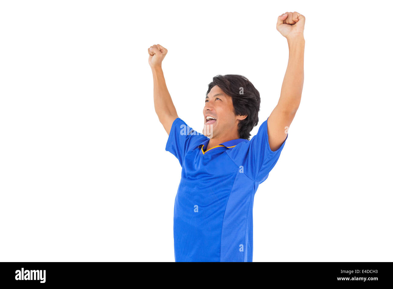 Football player in blue celebrating a victory Stock Photo - Alamy