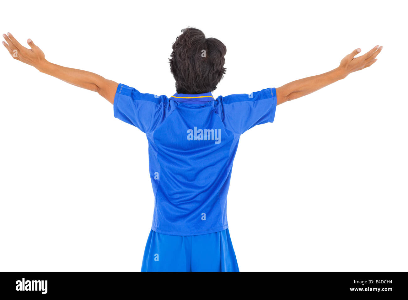 Football player in blue celebrating a victory Stock Photo - Alamy