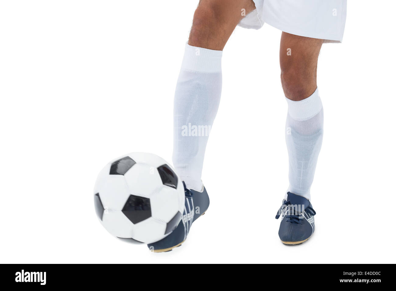 Football player kicking the ball Stock Photo - Alamy