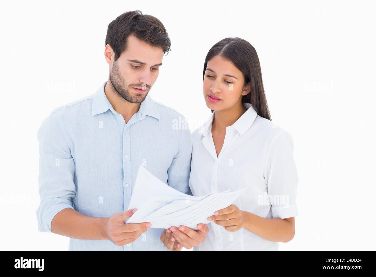 Young man woman reading documents hi-res stock photography and images ...