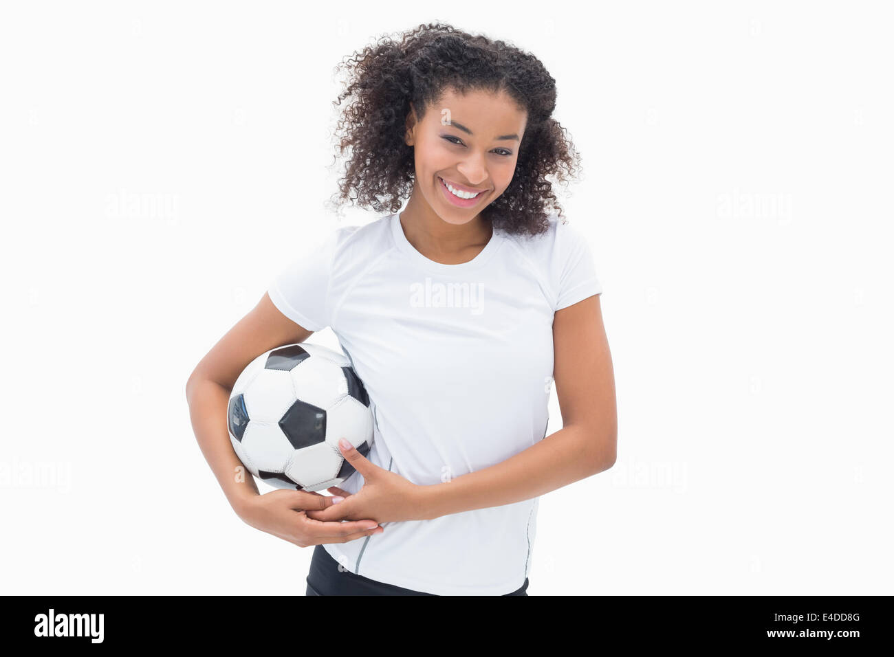 Pretty girl posing with her football Stock Photo - Alamy