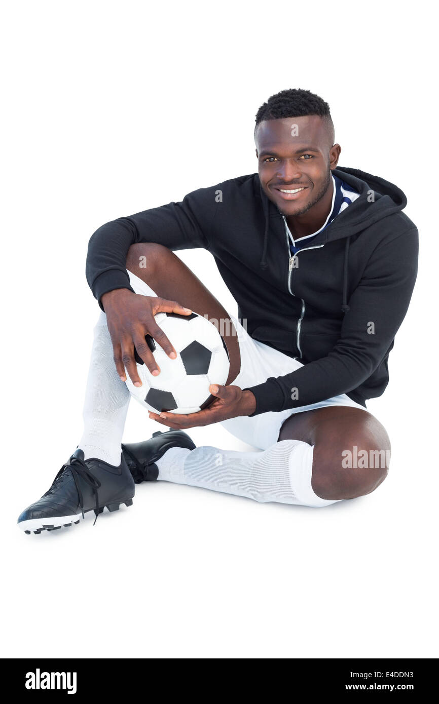 Smiling football player resting hi-res stock photography and images - Alamy