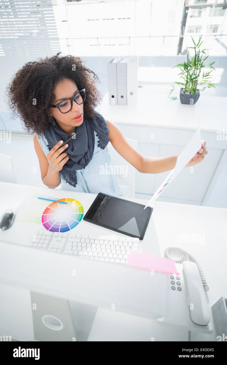 Pretty designer working at her desk Stock Photo - Alamy