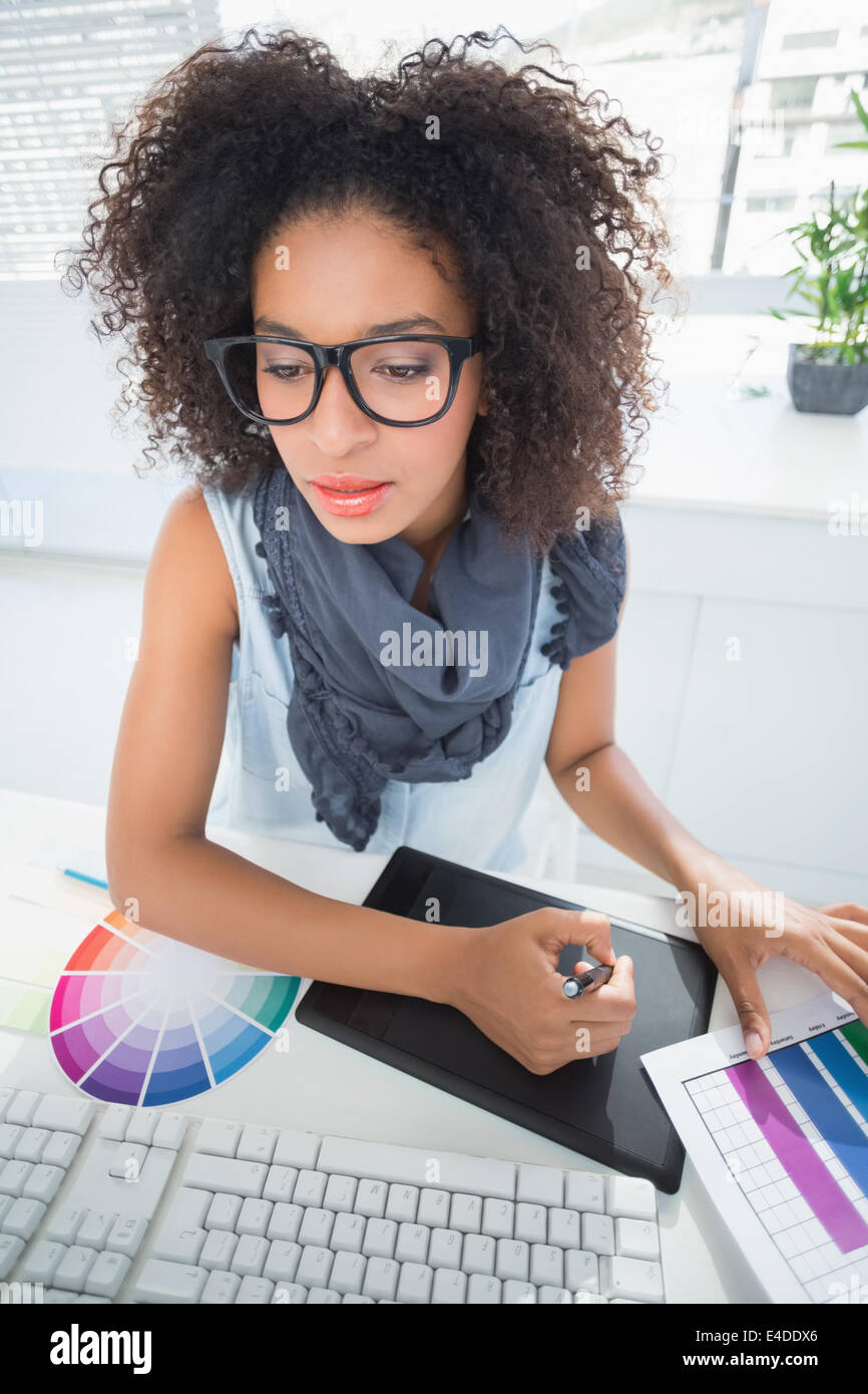 Pretty designer working at her desk Stock Photo - Alamy
