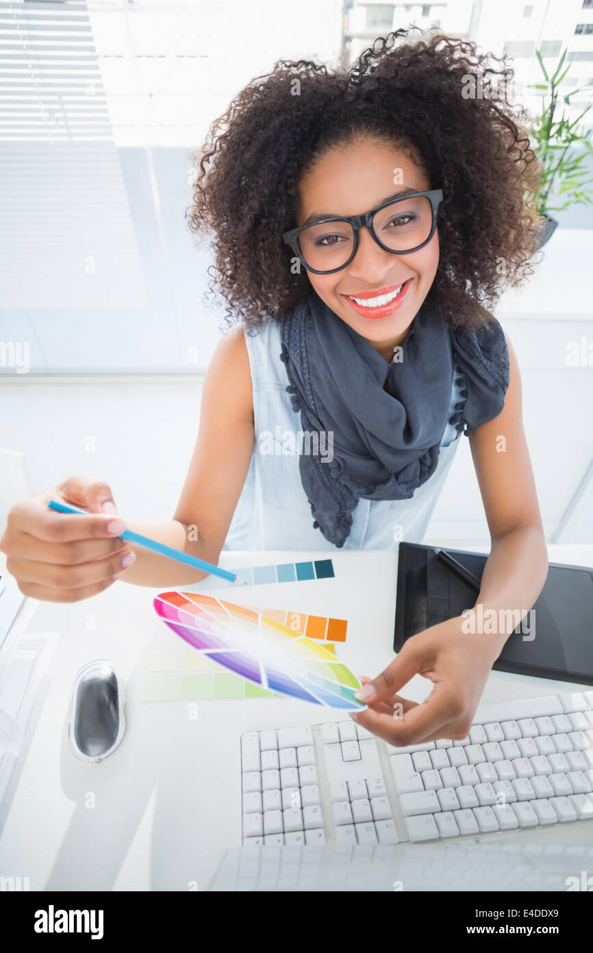 Pretty designer working at her desk Stock Photo - Alamy