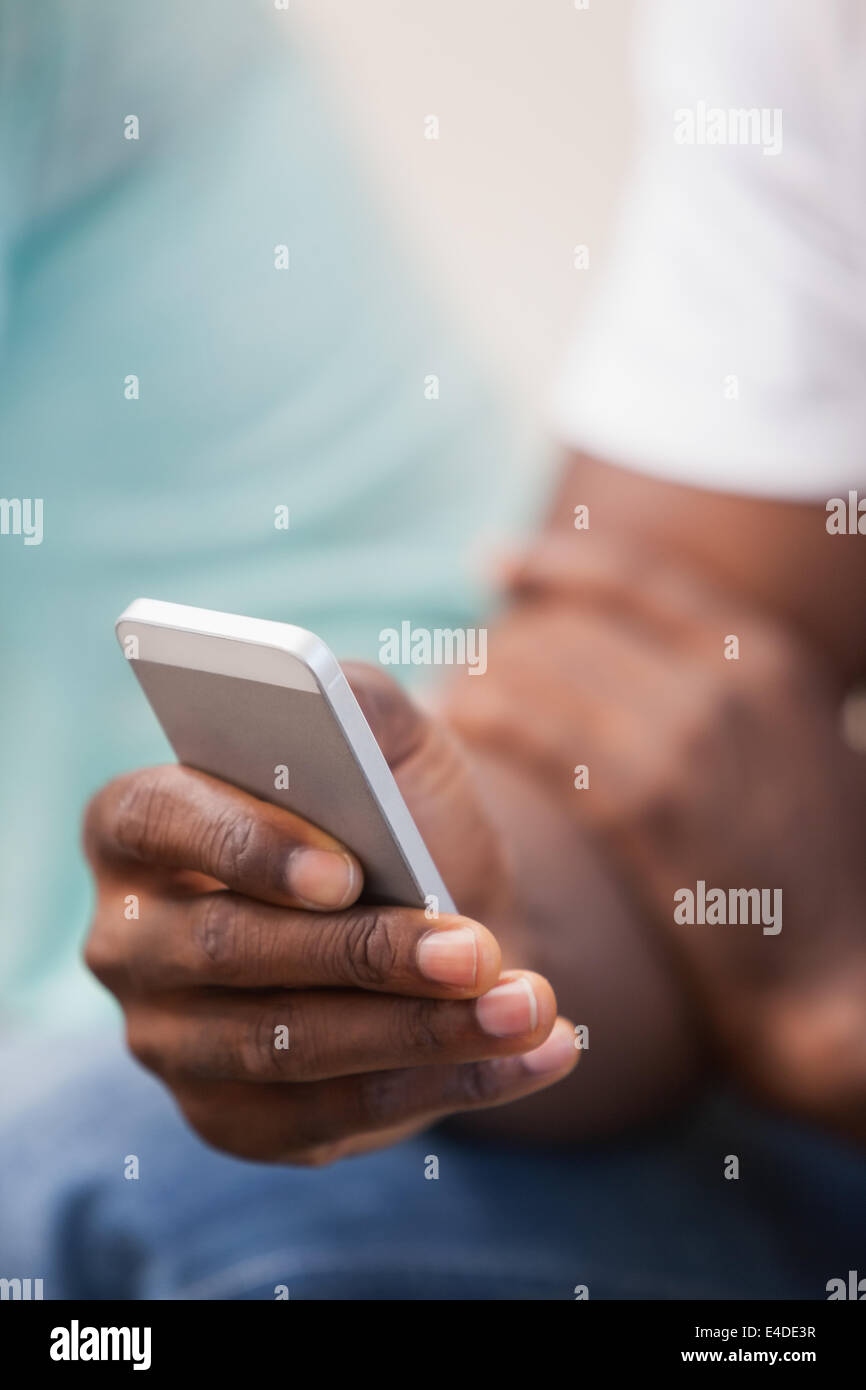 Man holding smartphone in hand Stock Photo - Alamy