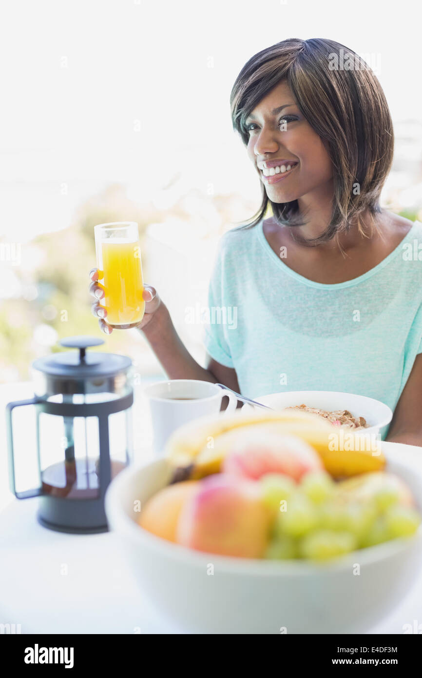 Woman having healthy breakfast outside hi-res stock photography and ...