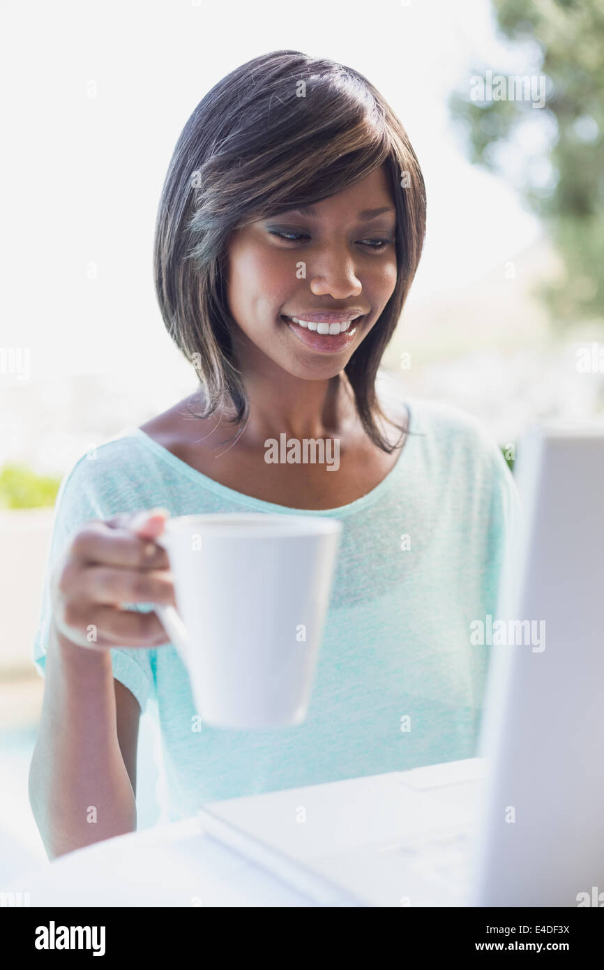 Sitting outside with laptop hi-res stock photography and images - Alamy
