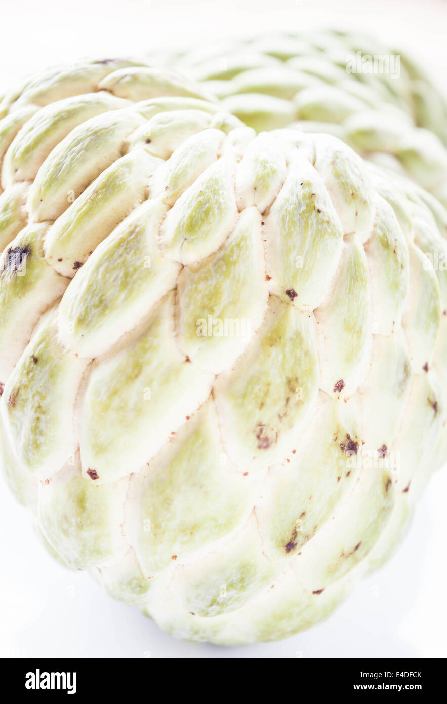 Close up green peel texture of custard apple Stock Photo - Alamy