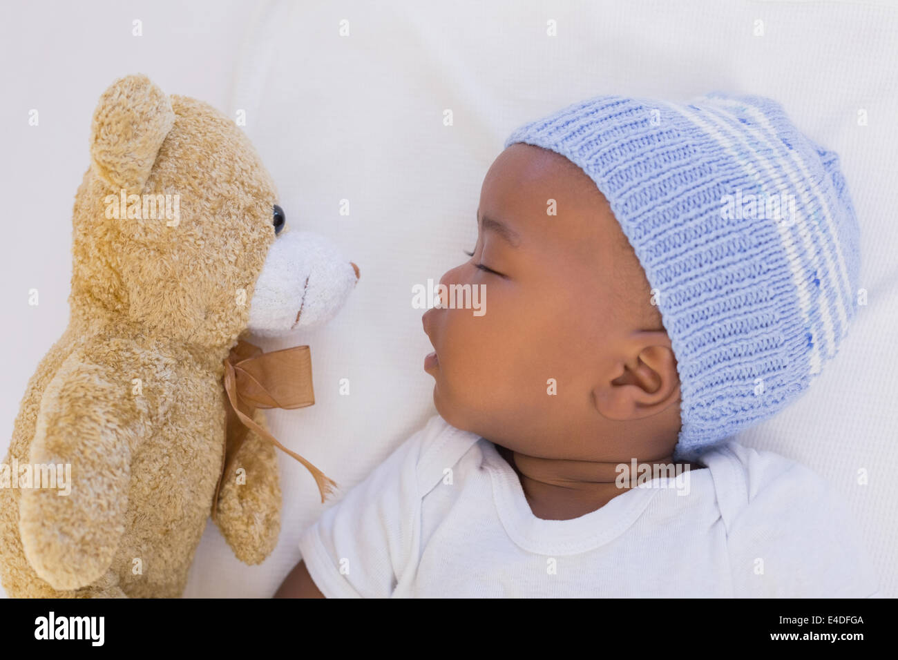 Boy asleep with teddy bear hi-res stock photography and images - Alamy