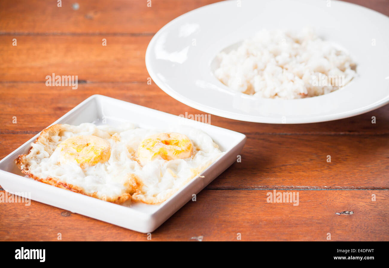 Easy meal with rice and double star eggs Stock Photo - Alamy