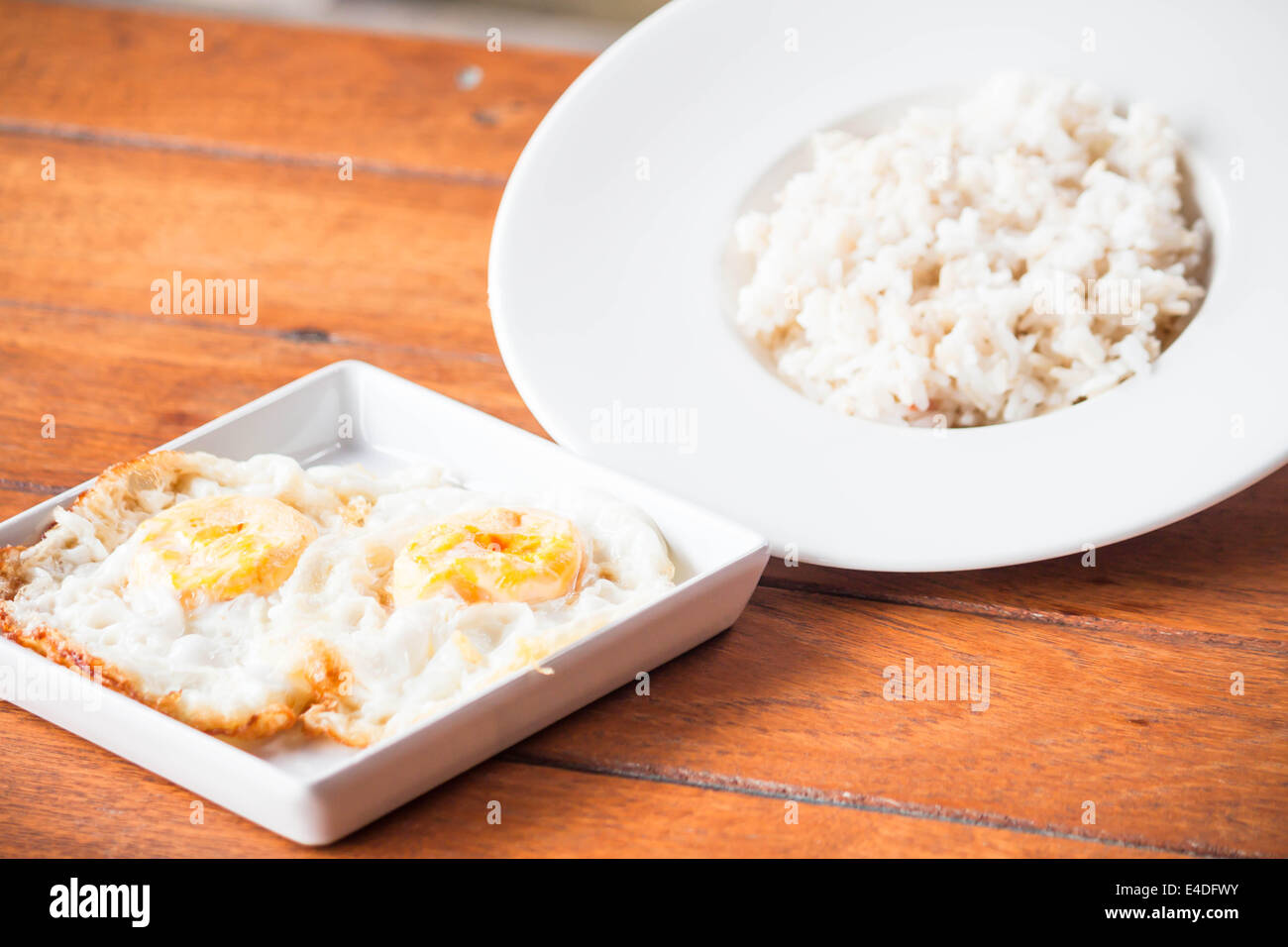 Fast cooking with rice and double star eggs Stock Photo - Alamy