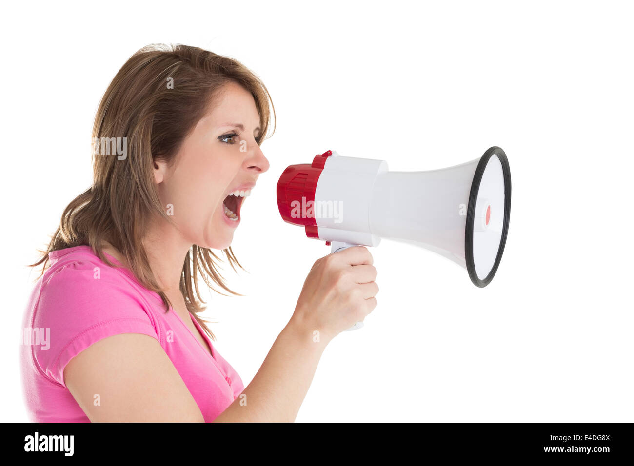 Close up side view of woman shouting into bullhorn Stock Photo - Alamy