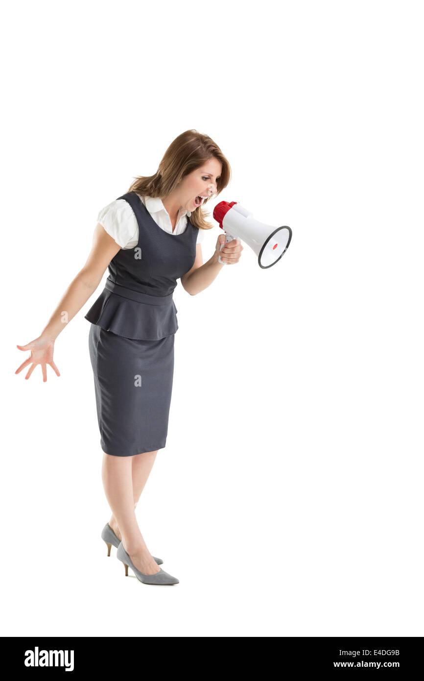 Young businesswoman shouting into bullhorn Stock Photo - Alamy