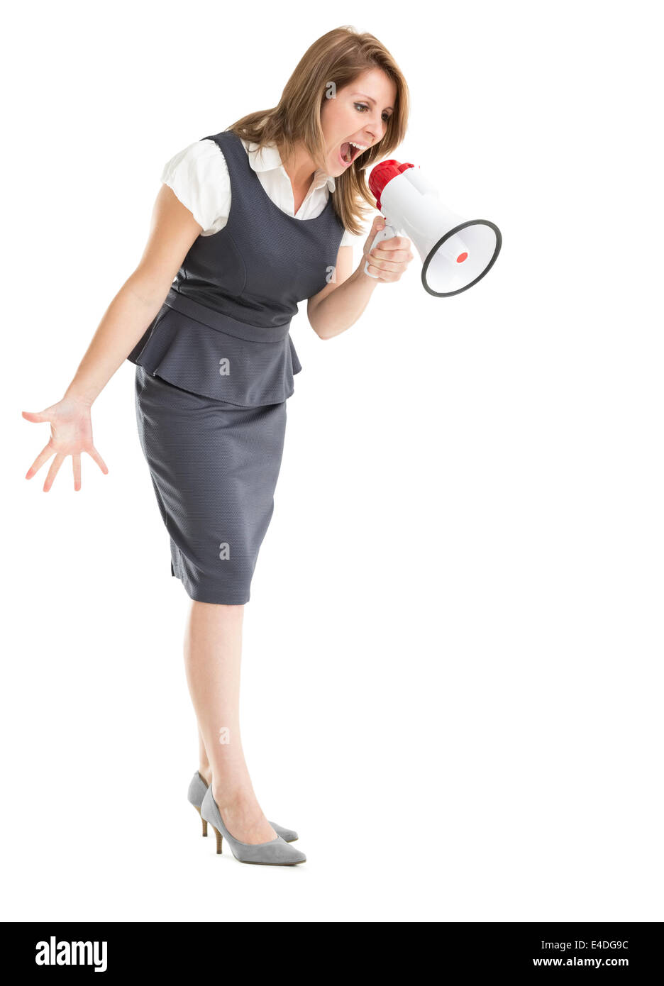 Young businesswoman shouting into bullhorn Stock Photo - Alamy