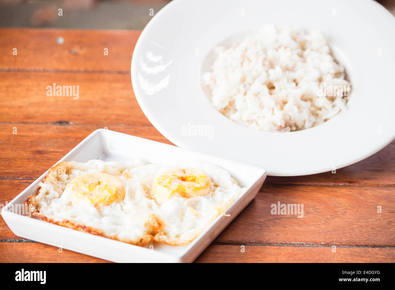 Homemade meal with rice and double star eggs Stock Photo - Alamy