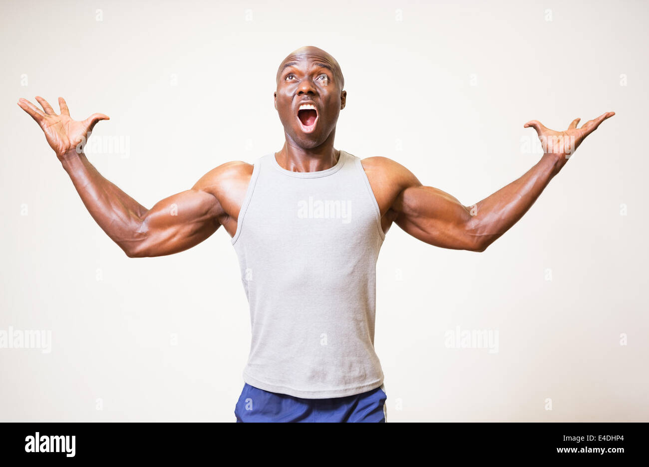 Portrait of a muscular man shouting Stock Photo - Alamy