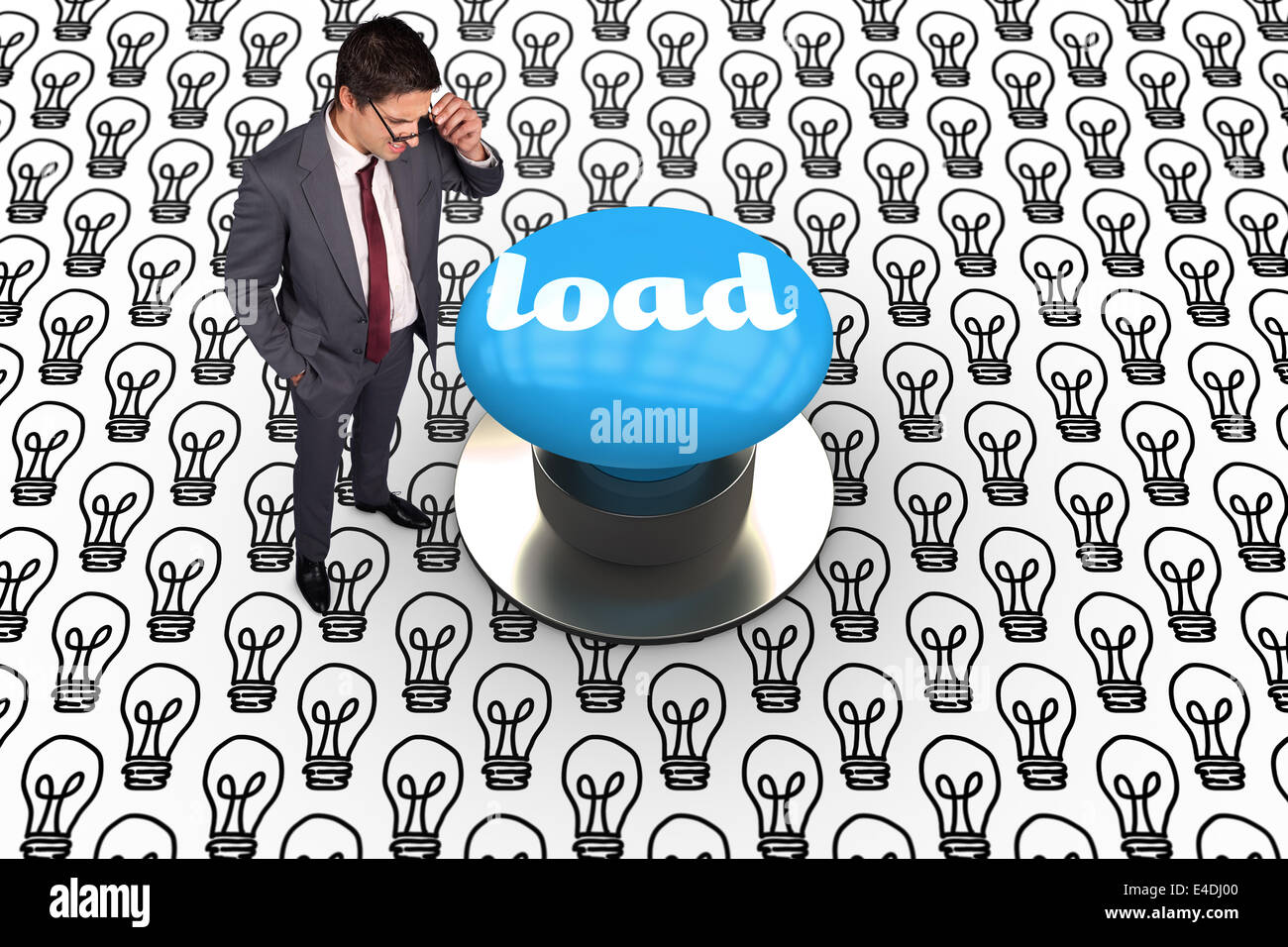 Load against blue push button Stock Photo - Alamy
