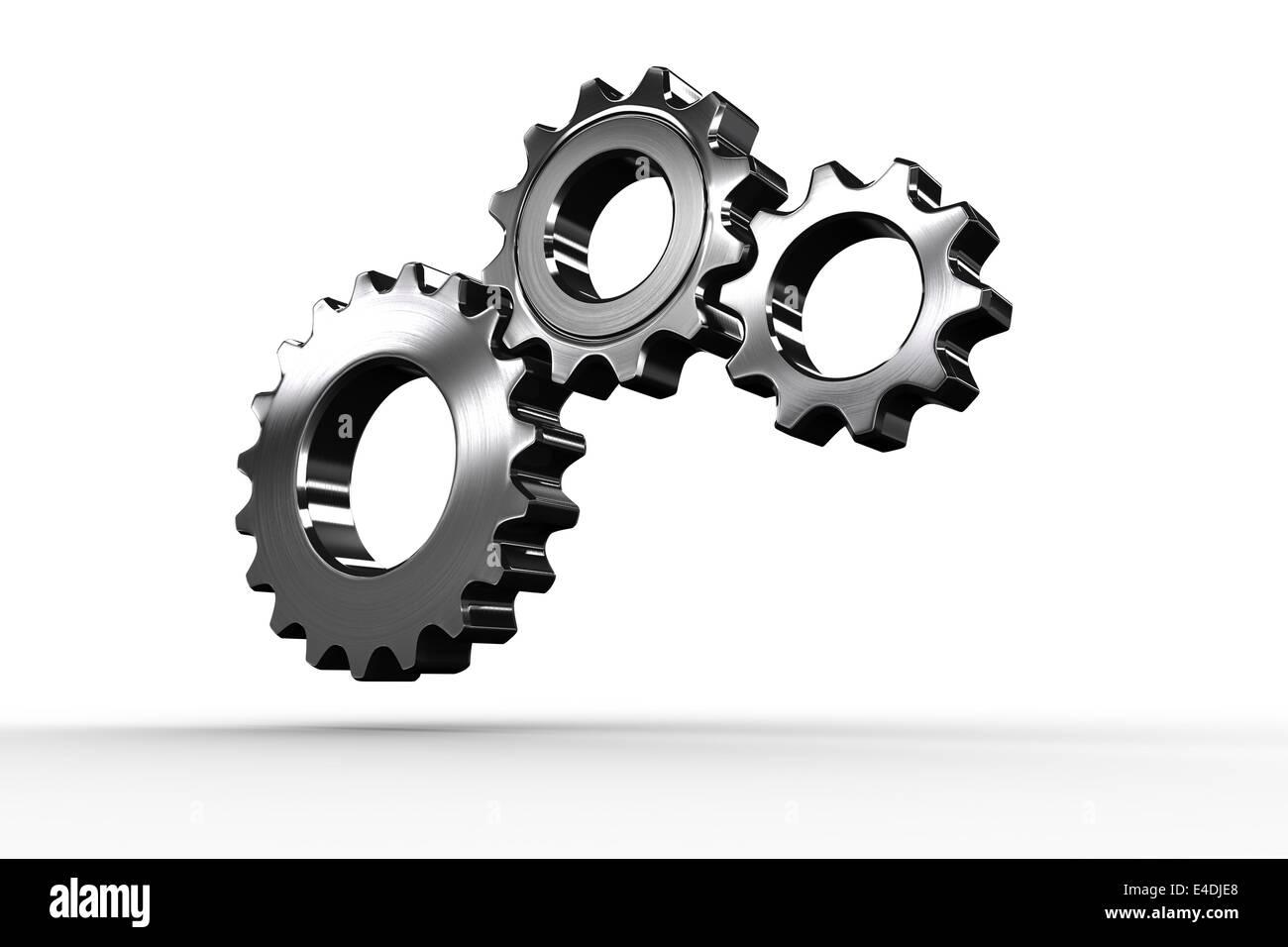 Metal cogs and wheels connecting Stock Photo - Alamy