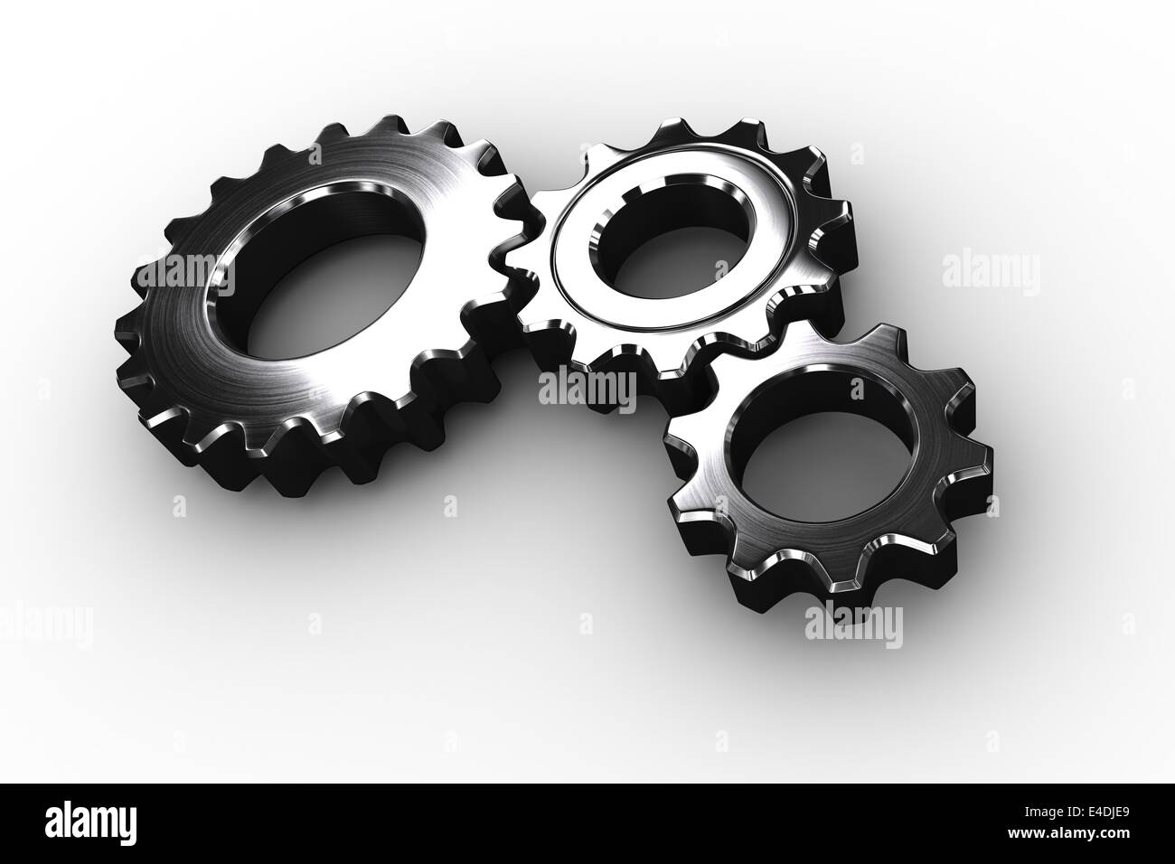 Metal cogs and wheels connecting Stock Photo - Alamy