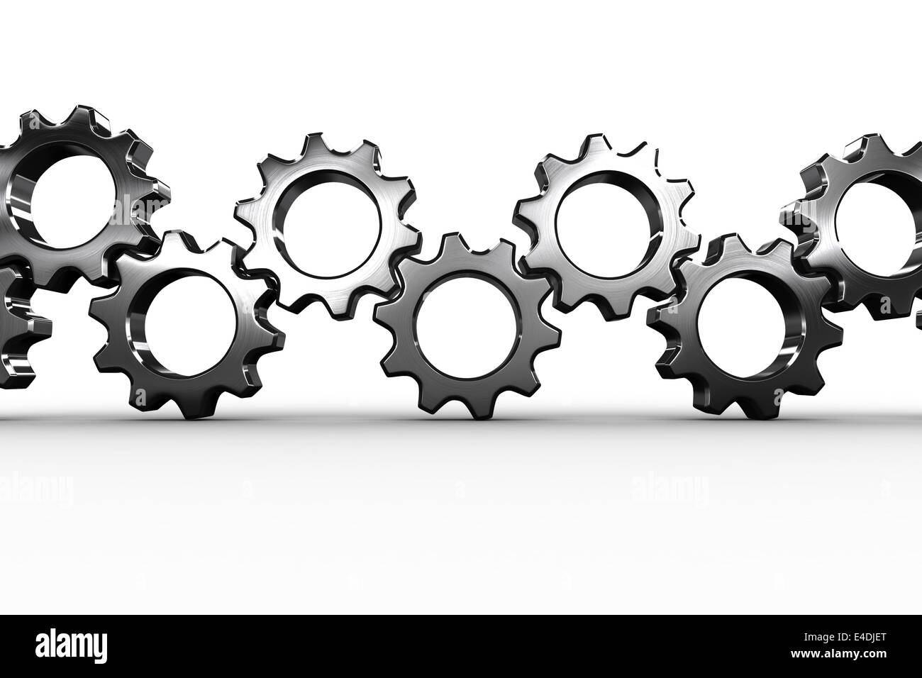 Metal cogs and wheels connecting Stock Photo - Alamy