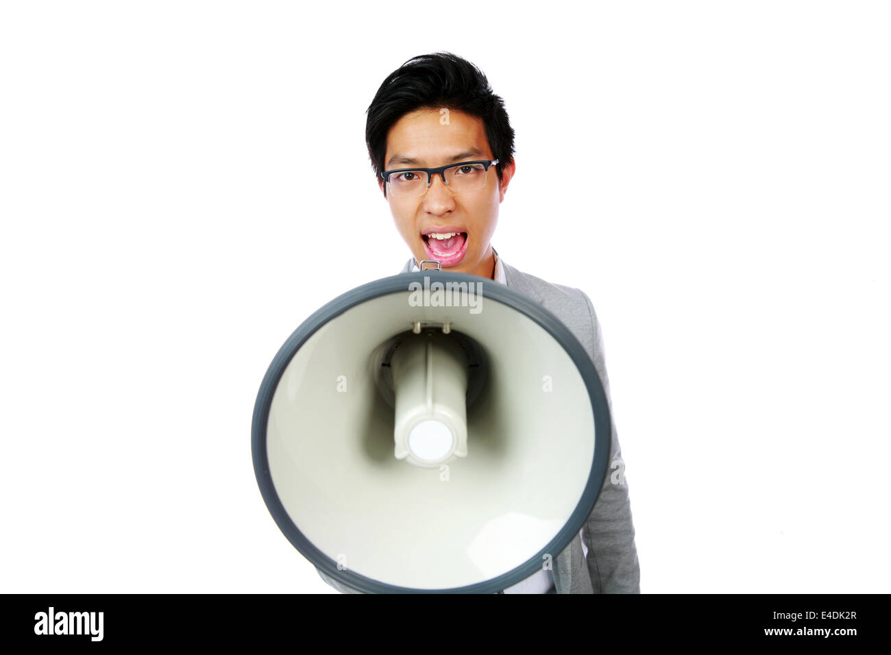 Portrait of young asian man shouting with megaphone Stock Photo - Alamy