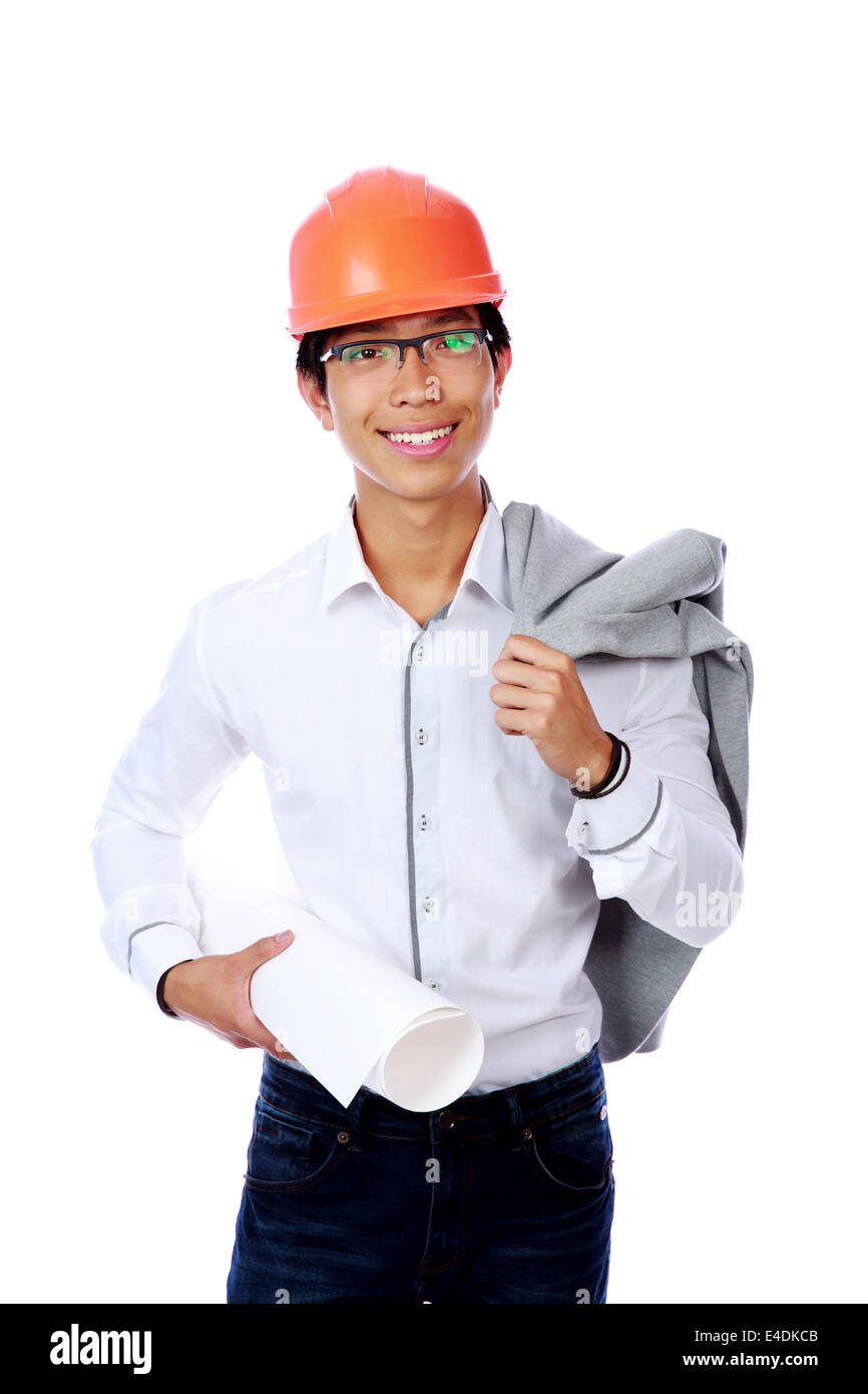Portrait of a happy asian engineer holding blueprint over white ...
