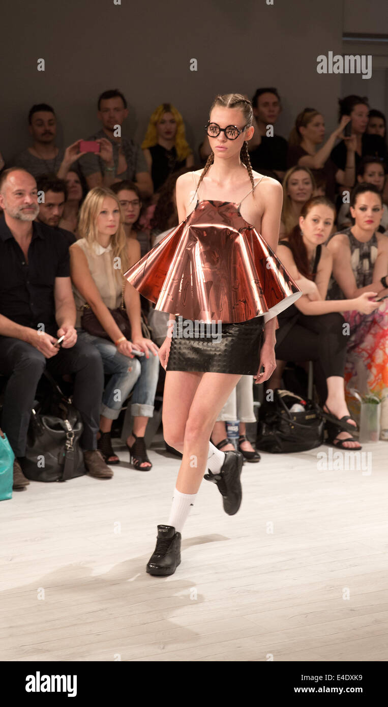 Berlin, Germany. 9th July, 2014. Models present fashion by Franziska ...