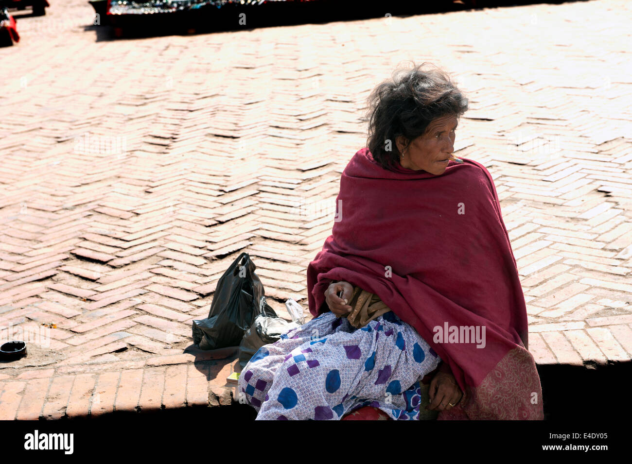 Homeless woman begging for money in Nepal Stock Photo - Alamy
