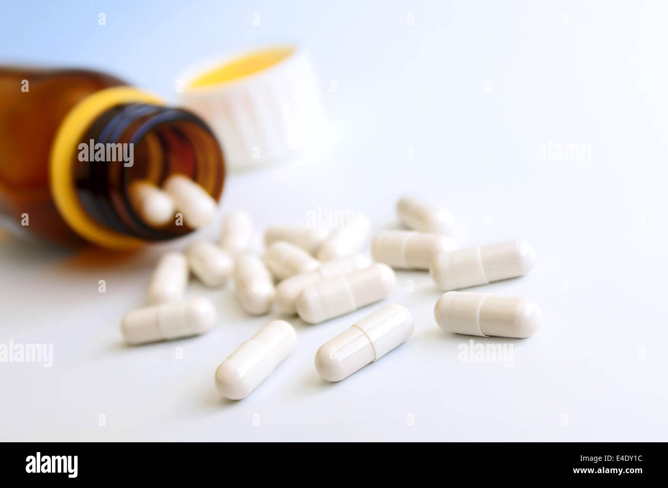 closeup on many medicine pills on white background Stock Photo - Alamy