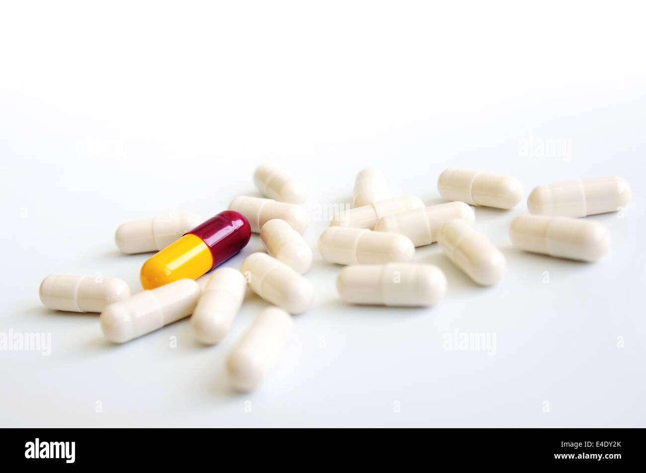 closeup on many medicine pills on white background Stock Photo - Alamy