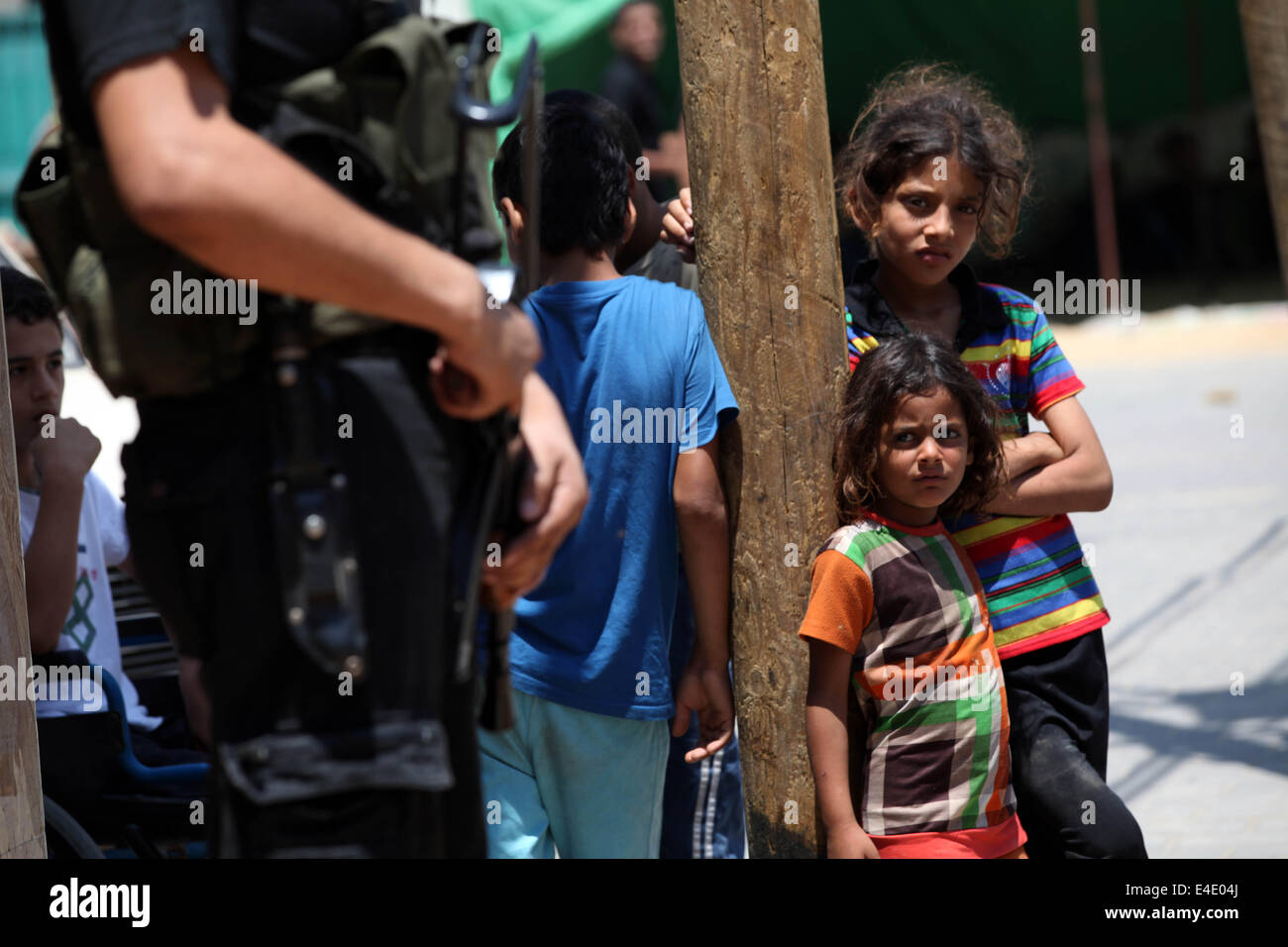Gaza, Palestinian Territories. 7th July, 2014. Mourners carry the body ...