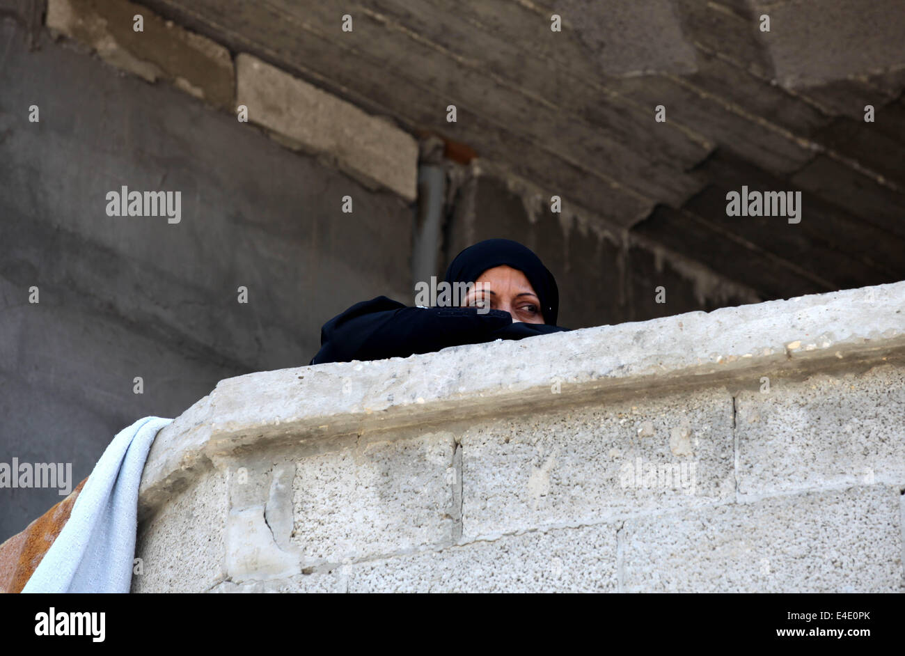 Gaza, Palestinian Territories. 7th July, 2014. Mourners carry the body ...