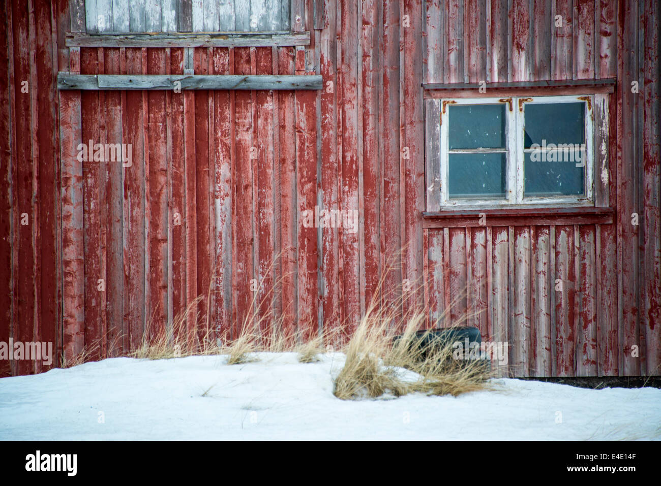 Red painted wall with window Stock Photo - Alamy